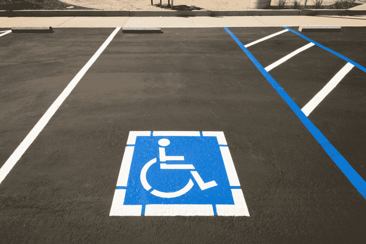 ADA Parking Lot Compliance | Why Blue Markings Matter